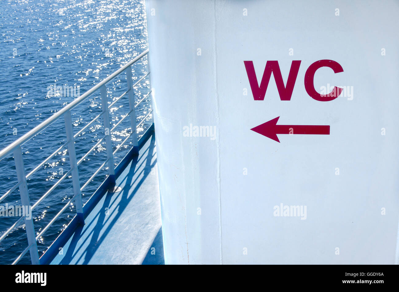 WC sign onboard a ship under sunlight Stock Photo - Alamy