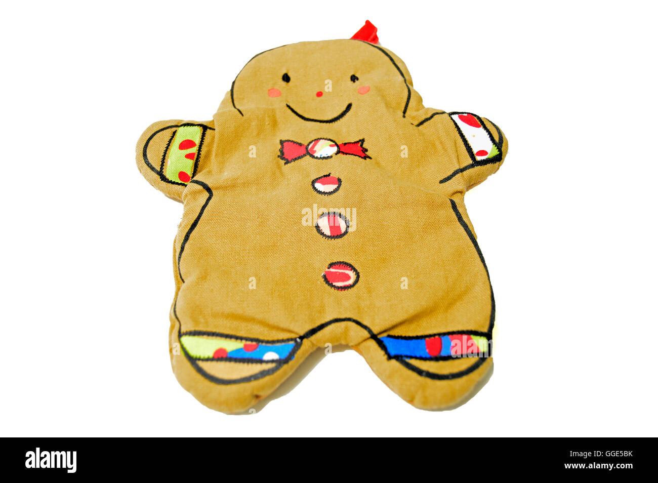 A brown fabric gingerbread man on a white background Stock Photo - Alamy