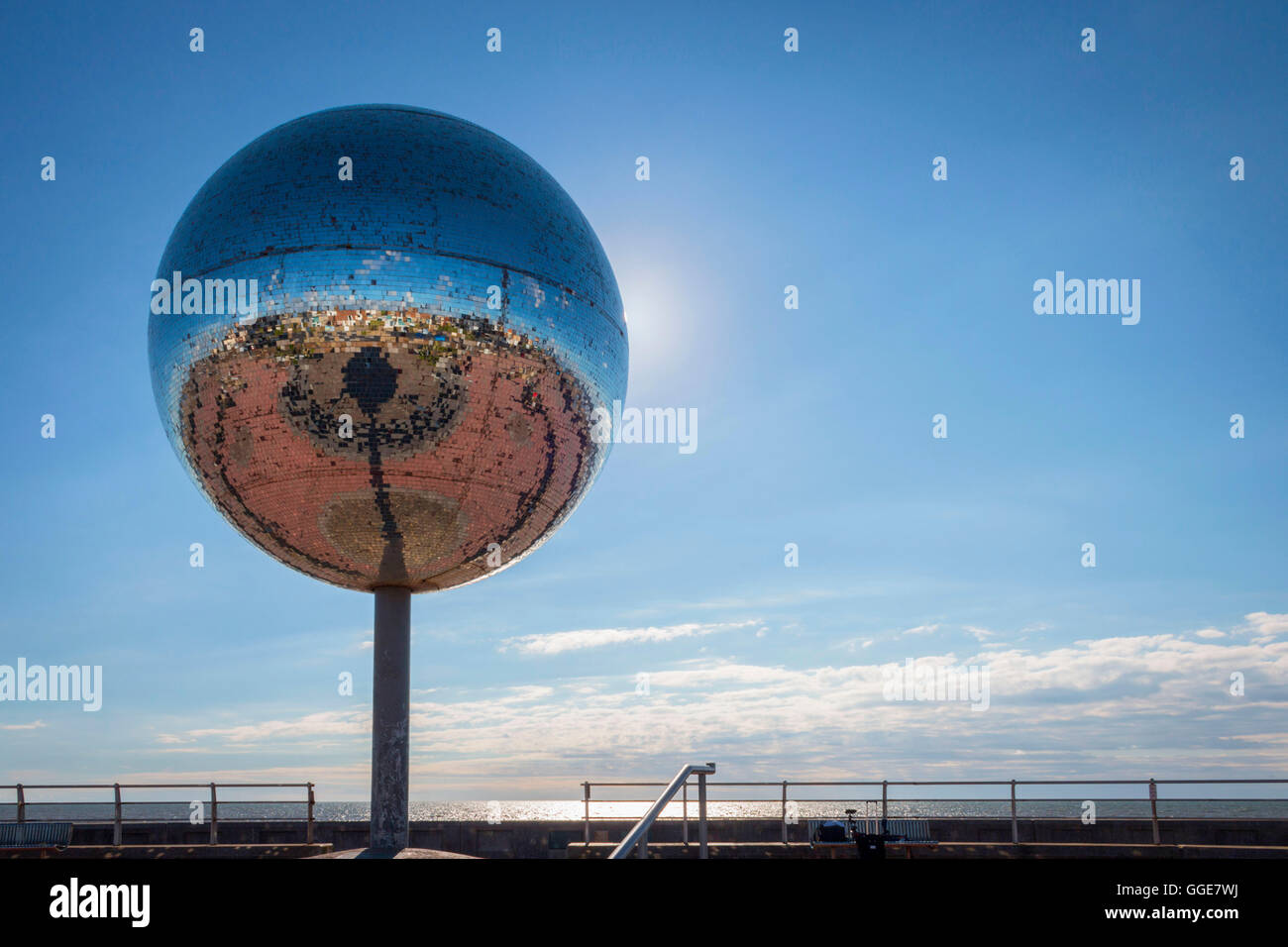 reflective mirrored ball sculpture on Blackpool beach front Stock Photo ...
