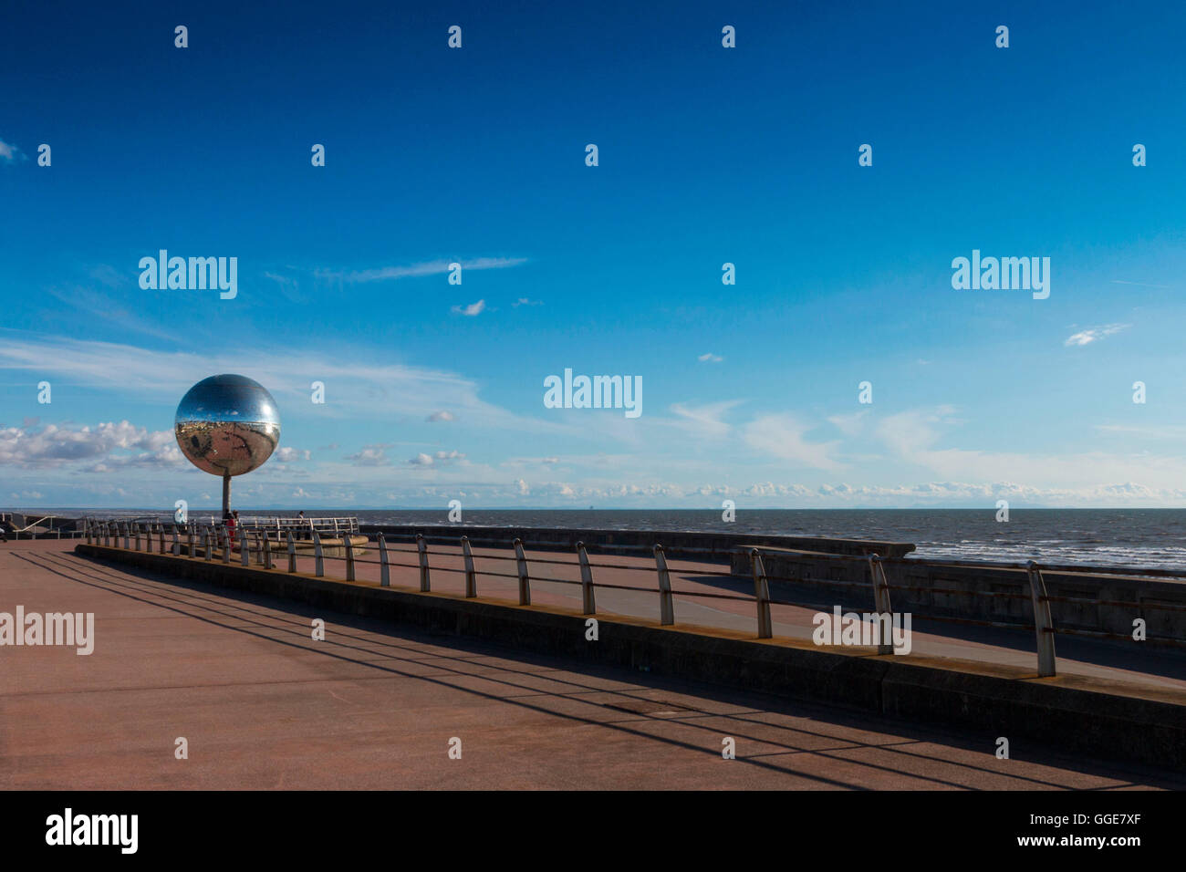 reflective mirrored ball sculpture on Blackpool beach front Stock Photo ...