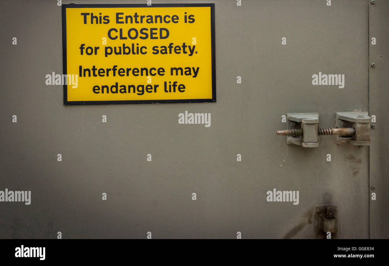 warning sign on safety flood gate on Blackpool beach Stock Photo - Alamy