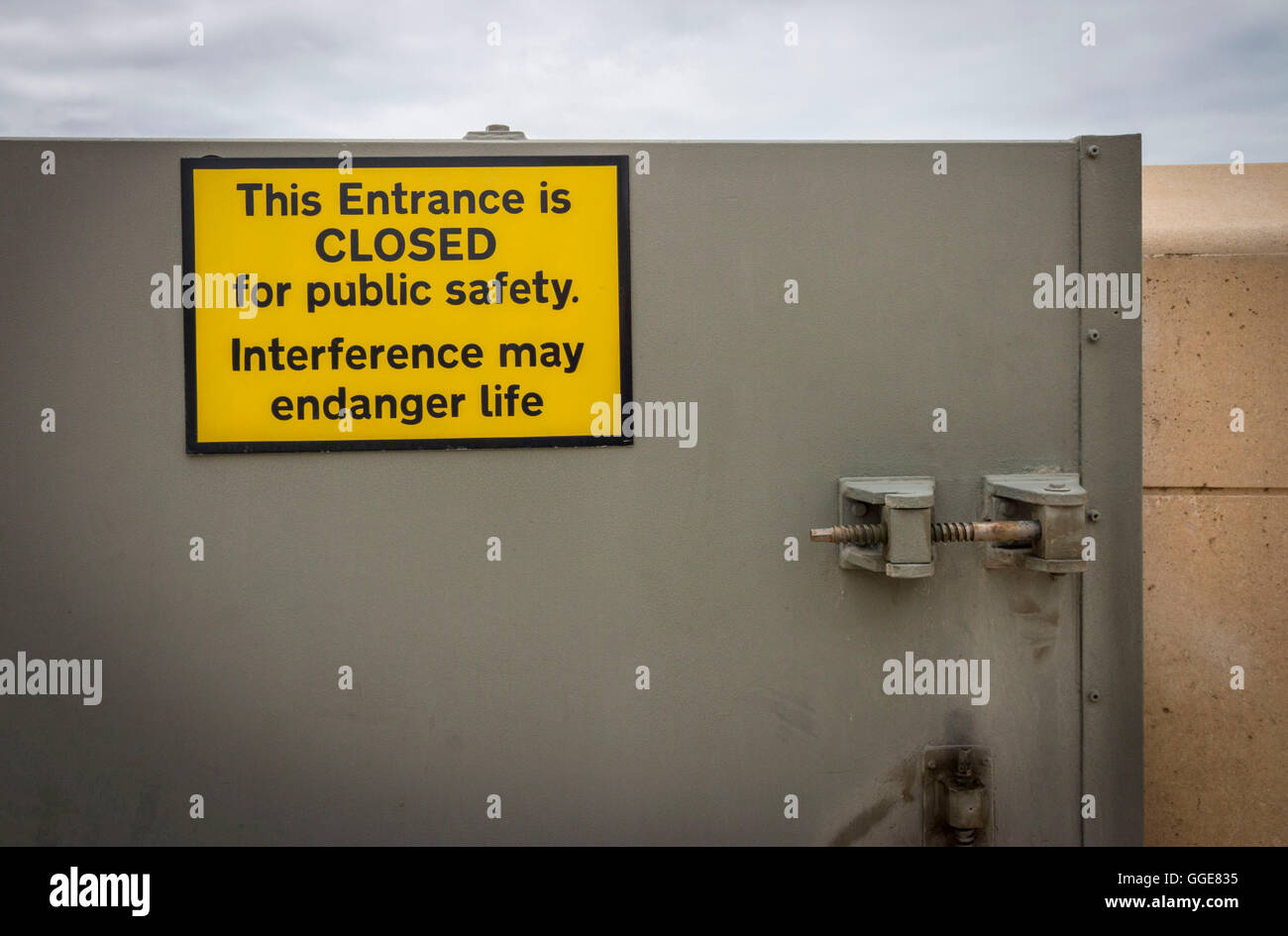 warning sign on safety flood gate on Blackpool beach Stock Photo - Alamy