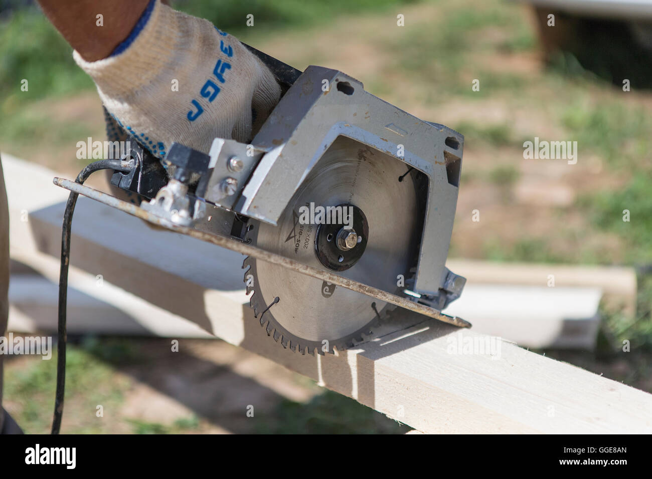 Circular saw cut wooden beam Stock Photo - Alamy