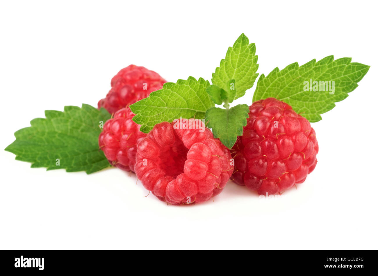 organic raspberries with mint leaves on white closeup Stock Photo - Alamy
