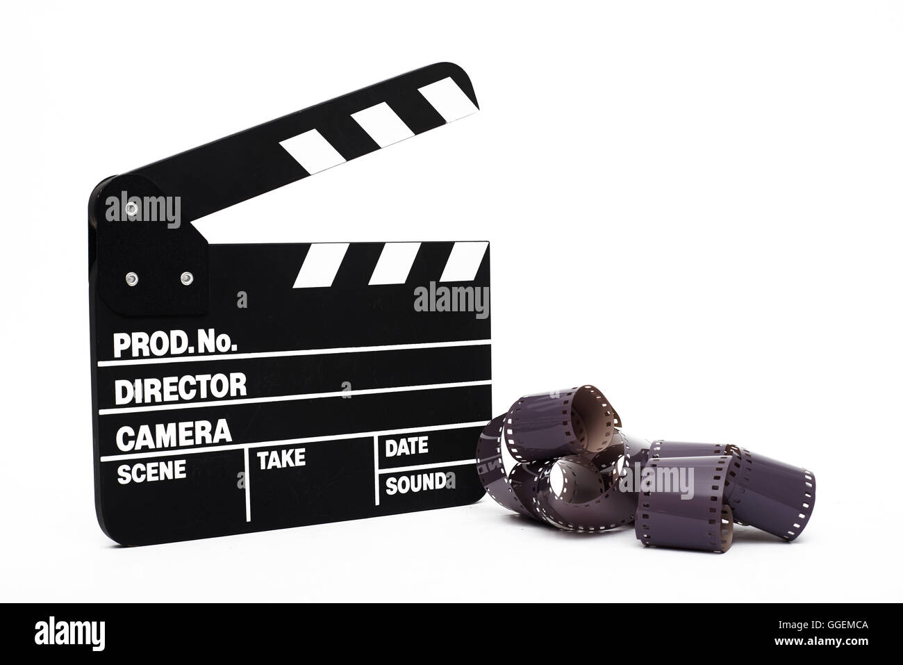 Movie clapper board and 35mm film on white background Stock Photo - Alamy