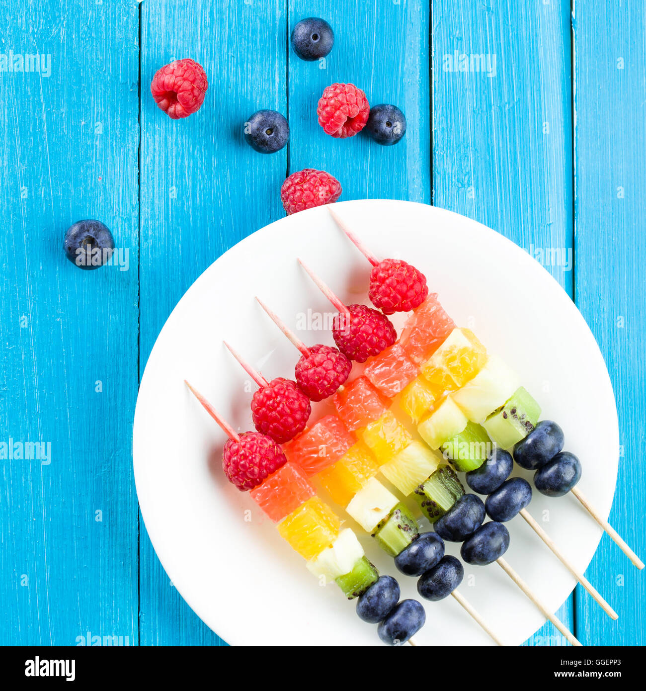 Fresh summer fruits on sticks Stock Photo - Alamy