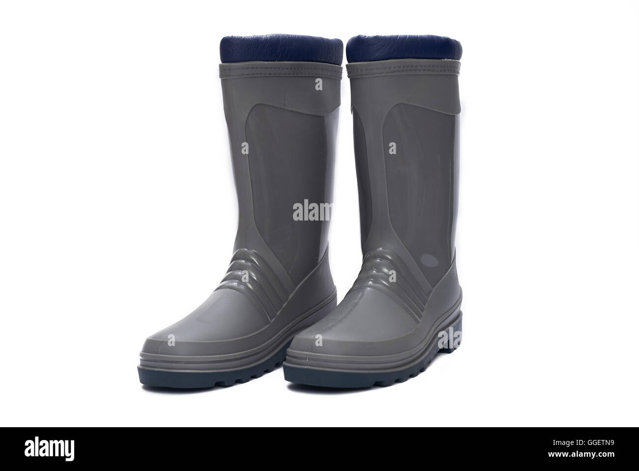 Plastic waterproof boots isolated on a white background Stock Photo - Alamy