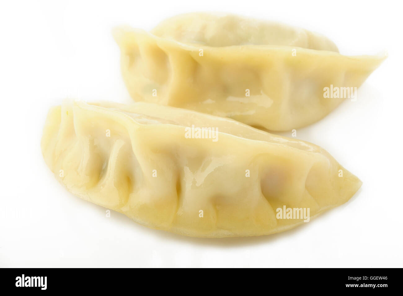 raw wonton on white background Stock Photo - Alamy