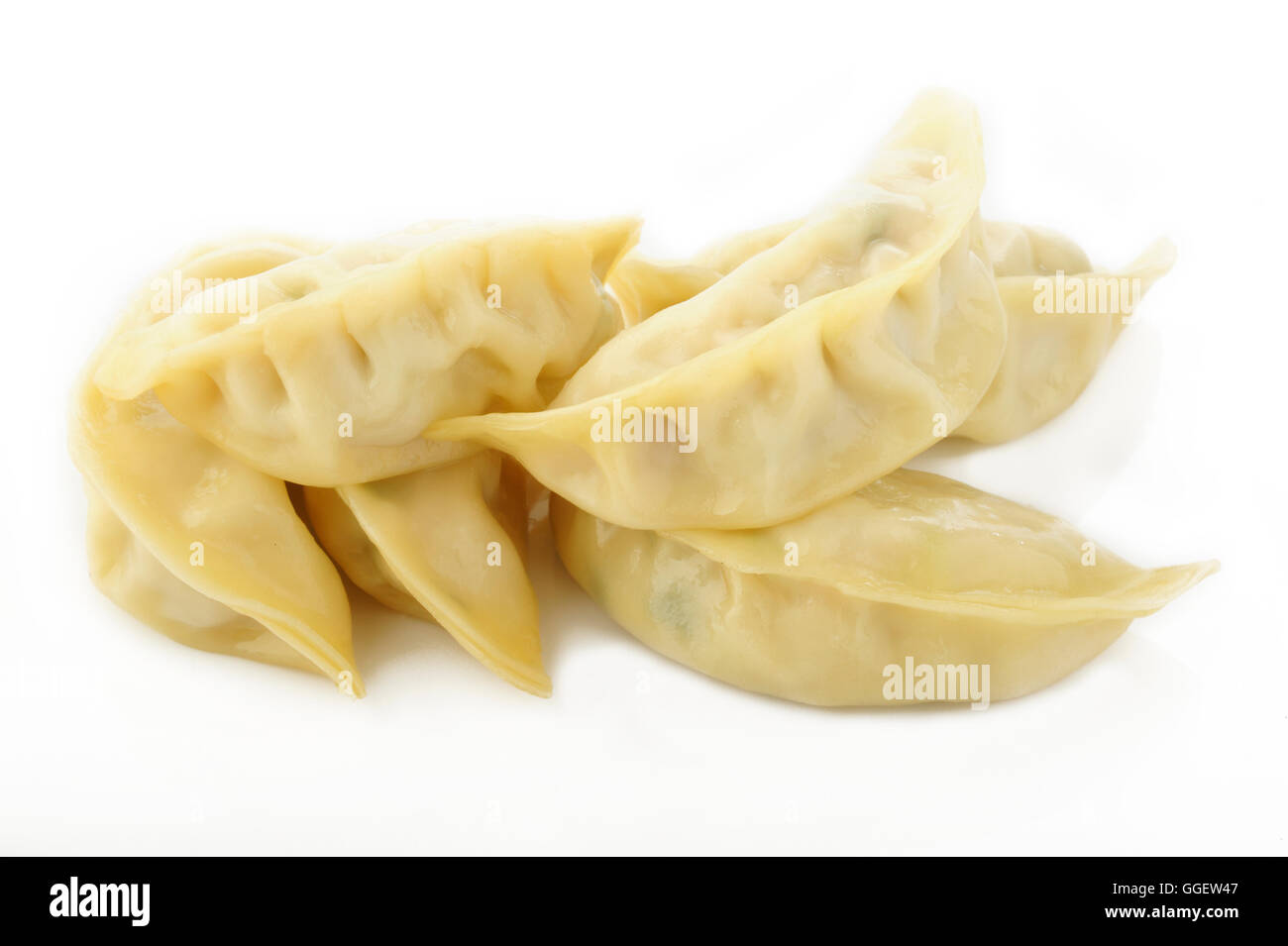 raw wonton on white background Stock Photo - Alamy