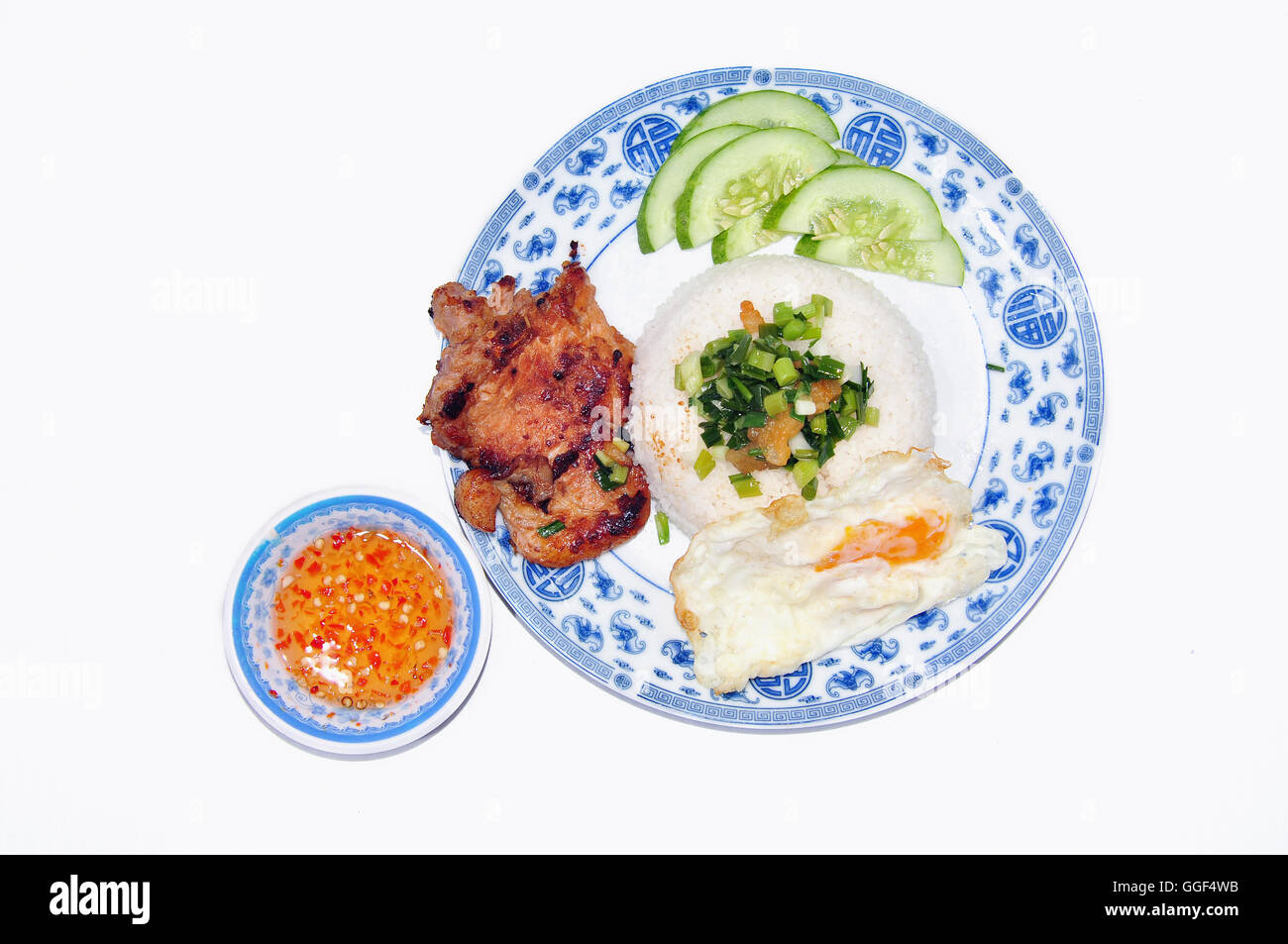 Vietnamese broken rice or Com tam on a white background Stock Photo - Alamy
