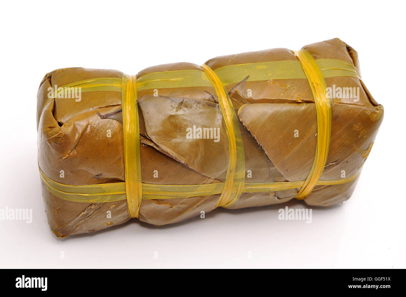 Vietnamese Cylindrical Sticky Rice Cake or Banh Tet on a white ...