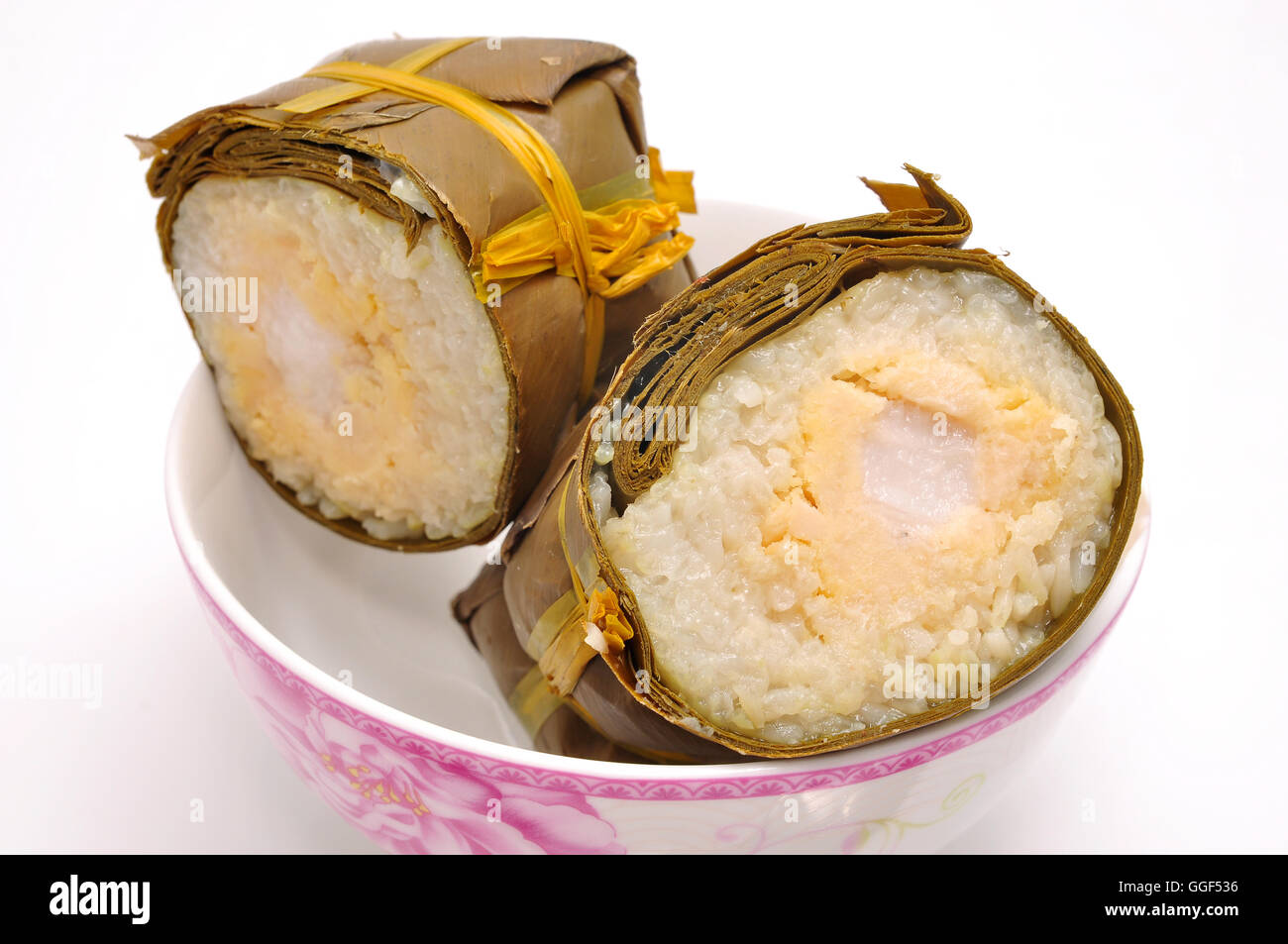 Vietnamese Cylindrical Sticky Rice Cake or Banh Tet on a white ...