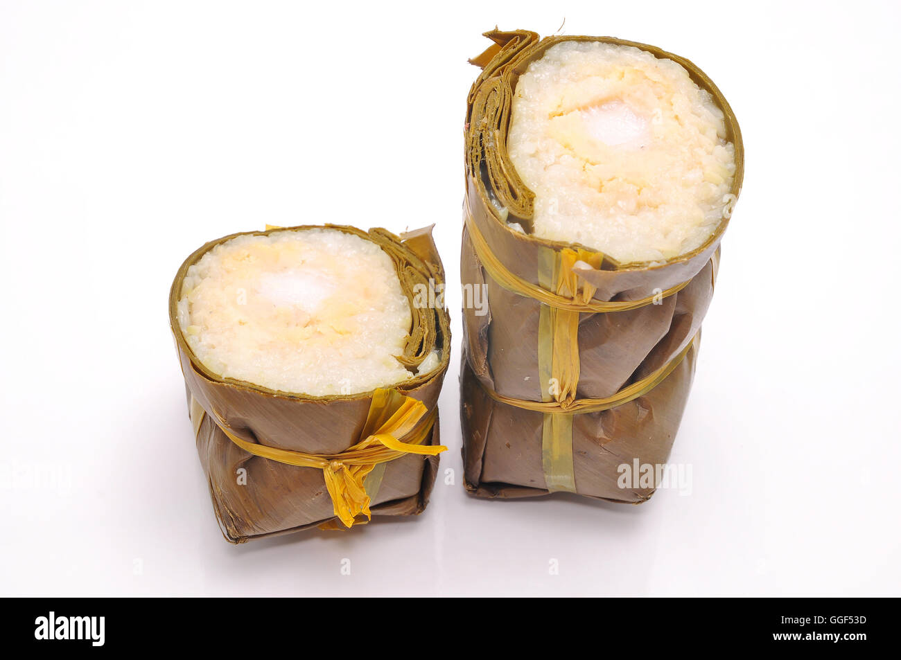 Vietnamese Cylindrical Sticky Rice Cake or Banh Tet on a white ...