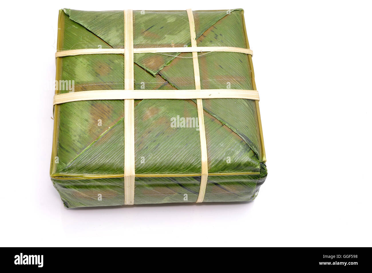 stuffed sticky rice cake or Banh Chung on a white background Stock ...