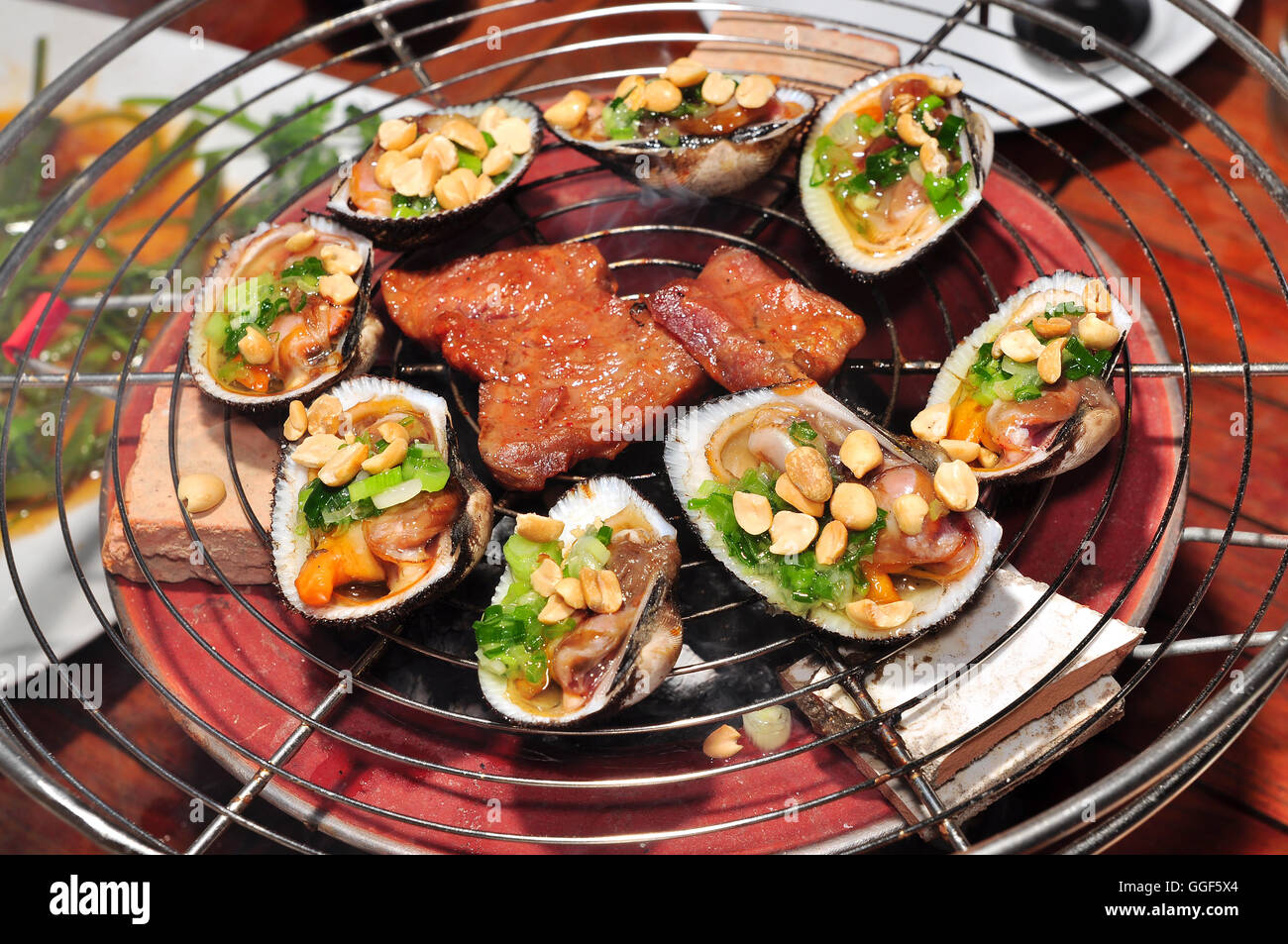 Shell steaks on the grill Stock Photo - Alamy