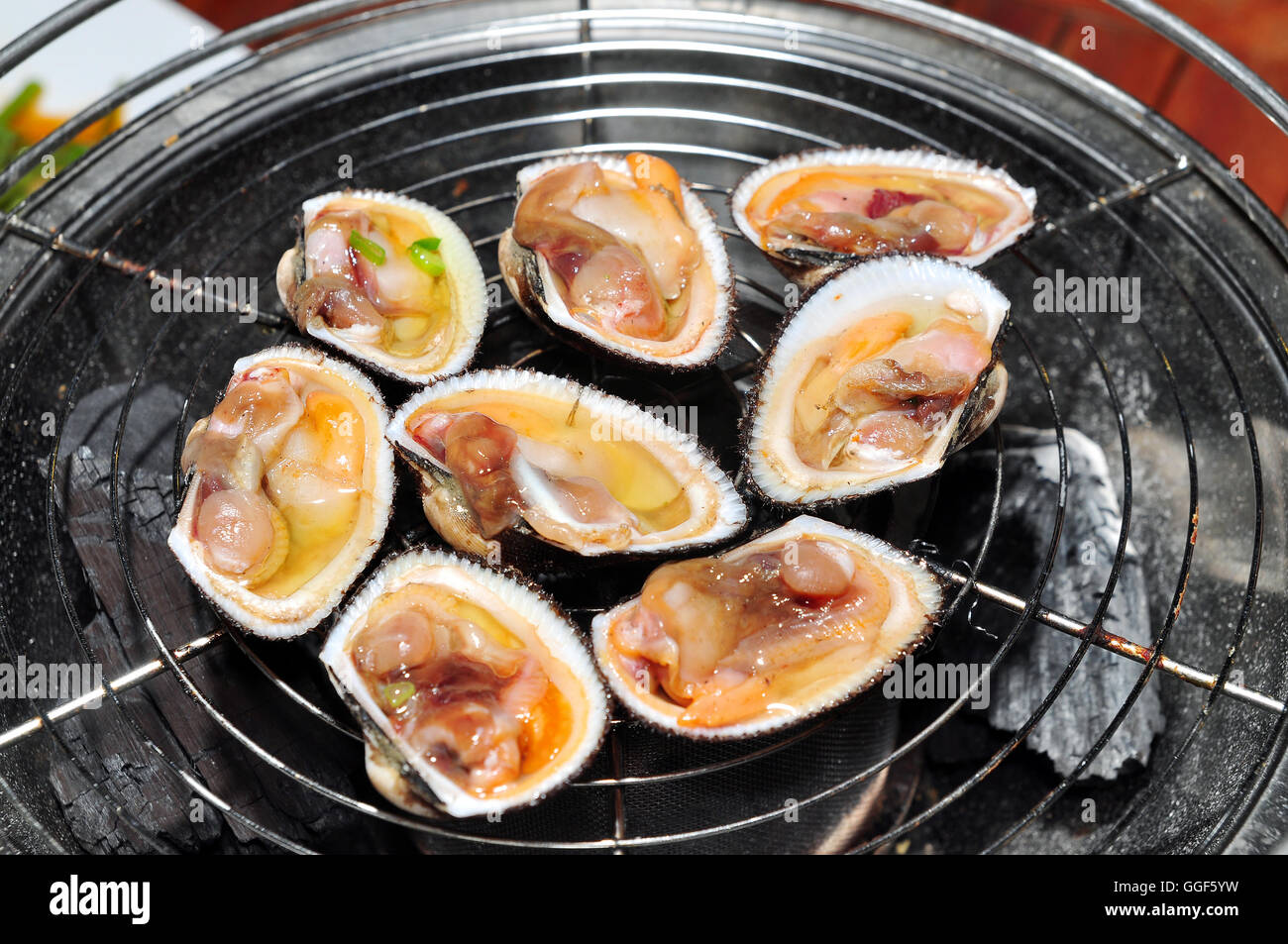 Shell steaks on the grill Stock Photo - Alamy