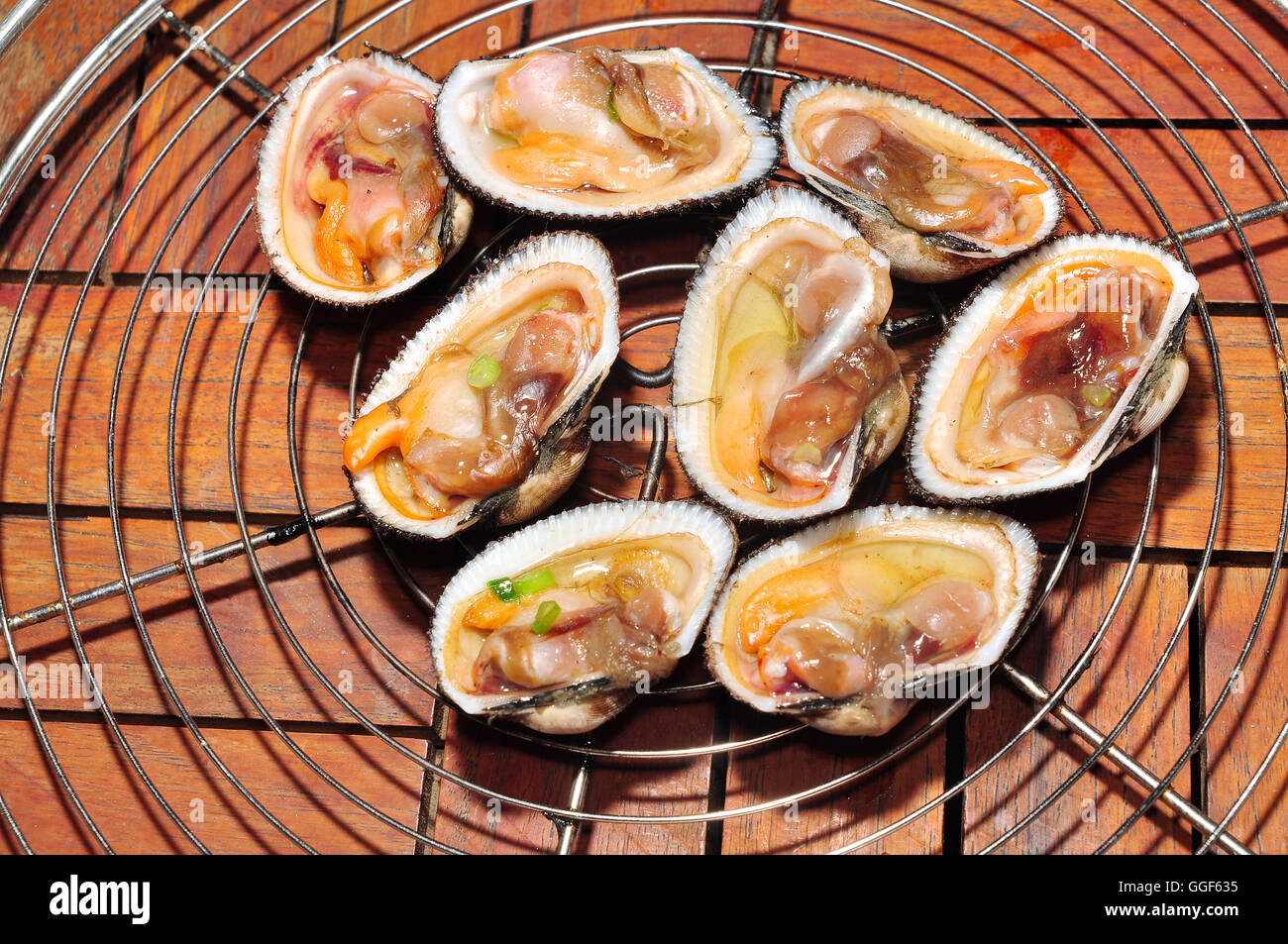 Shell steaks on the grill Stock Photo - Alamy