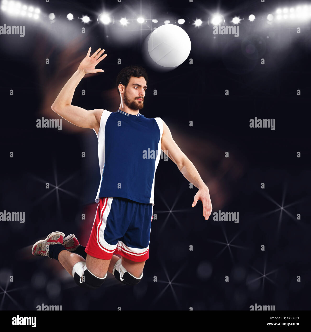 Volleyball player beats ball Stock Photo - Alamy