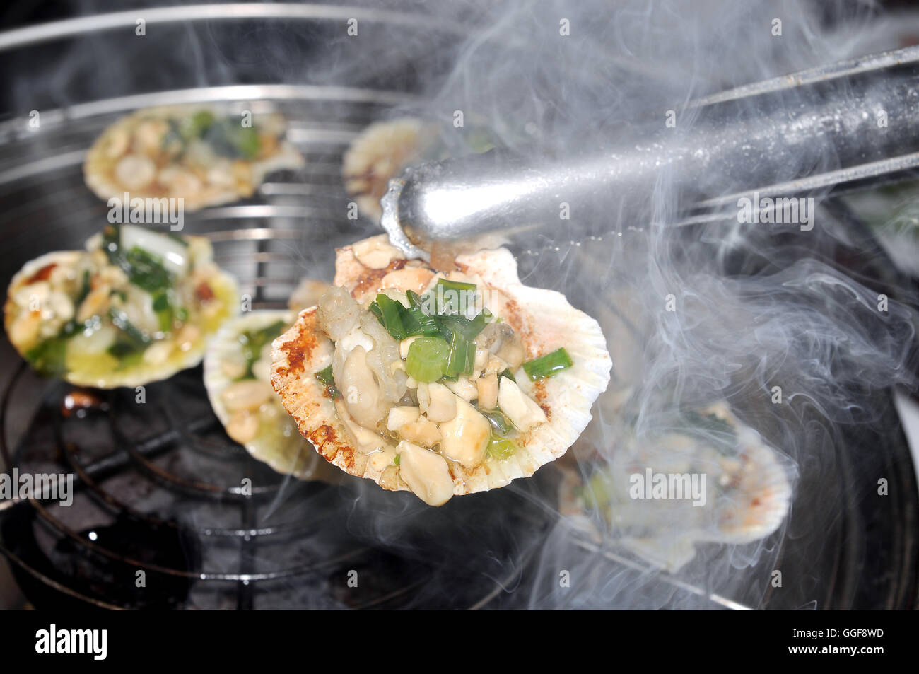 Shell steaks on the grill Stock Photo - Alamy