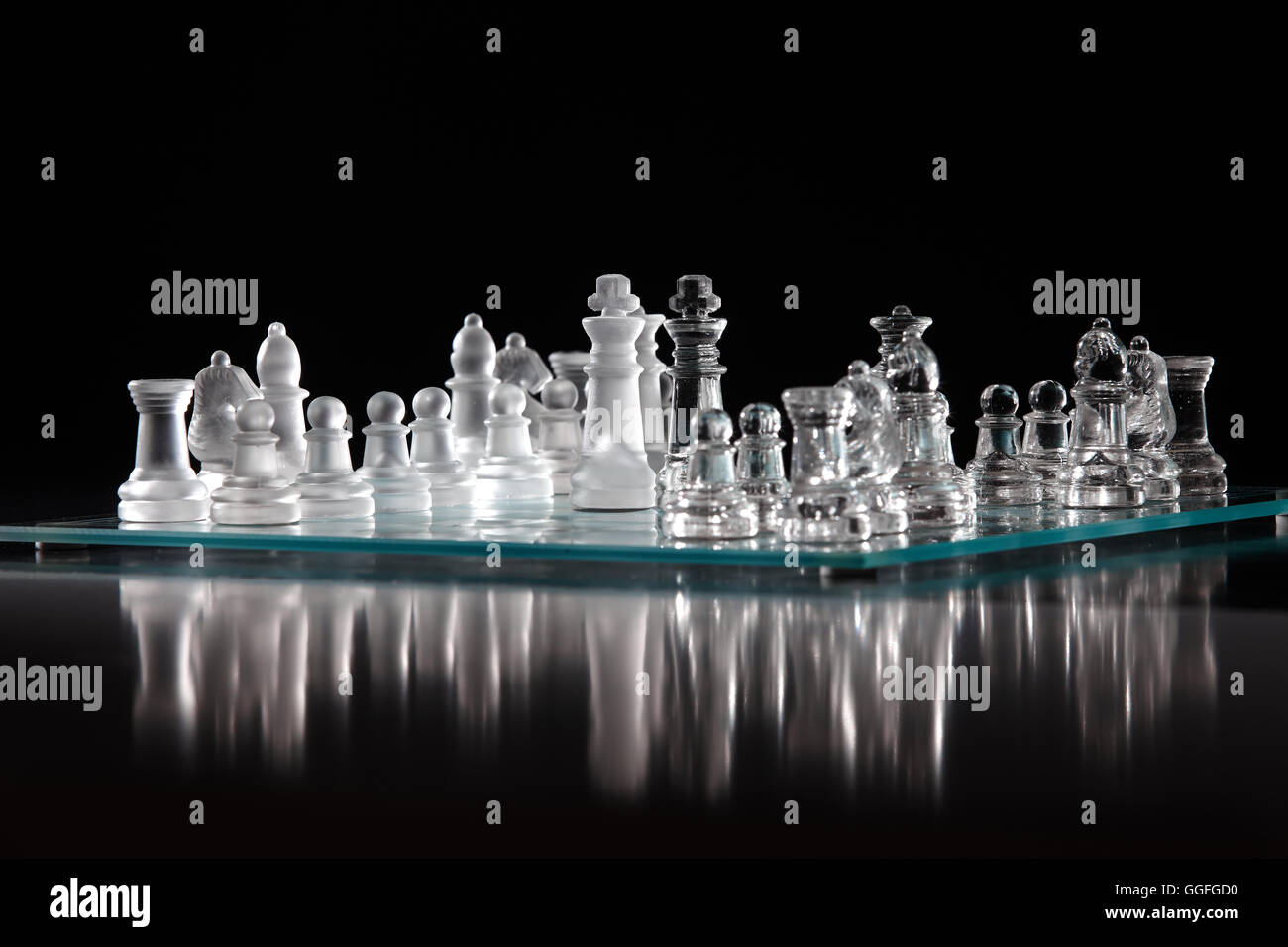 glass chess board with chess pieces on Stock Photo - Alamy