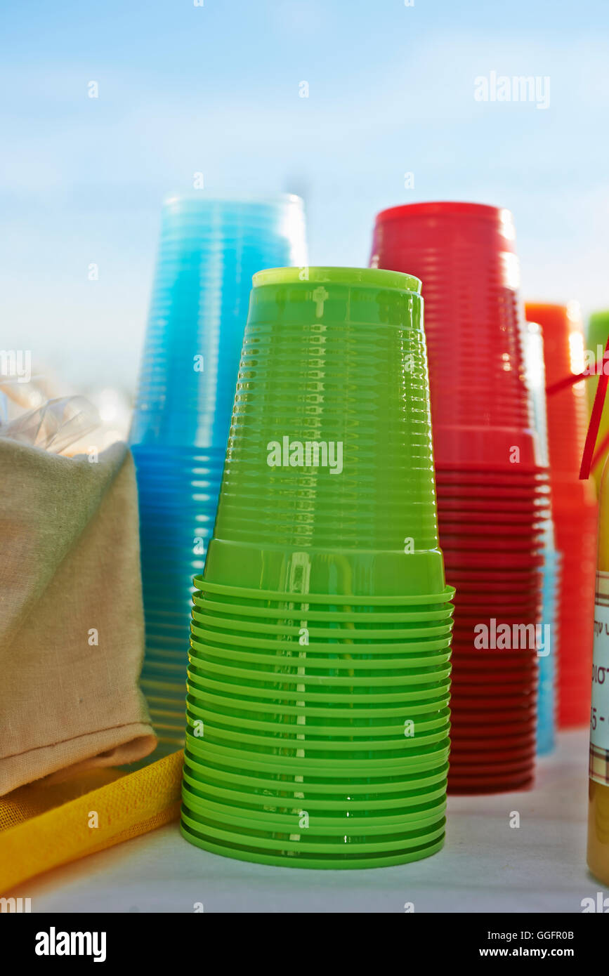 many colorful plastic cups in a party Stock Photo - Alamy