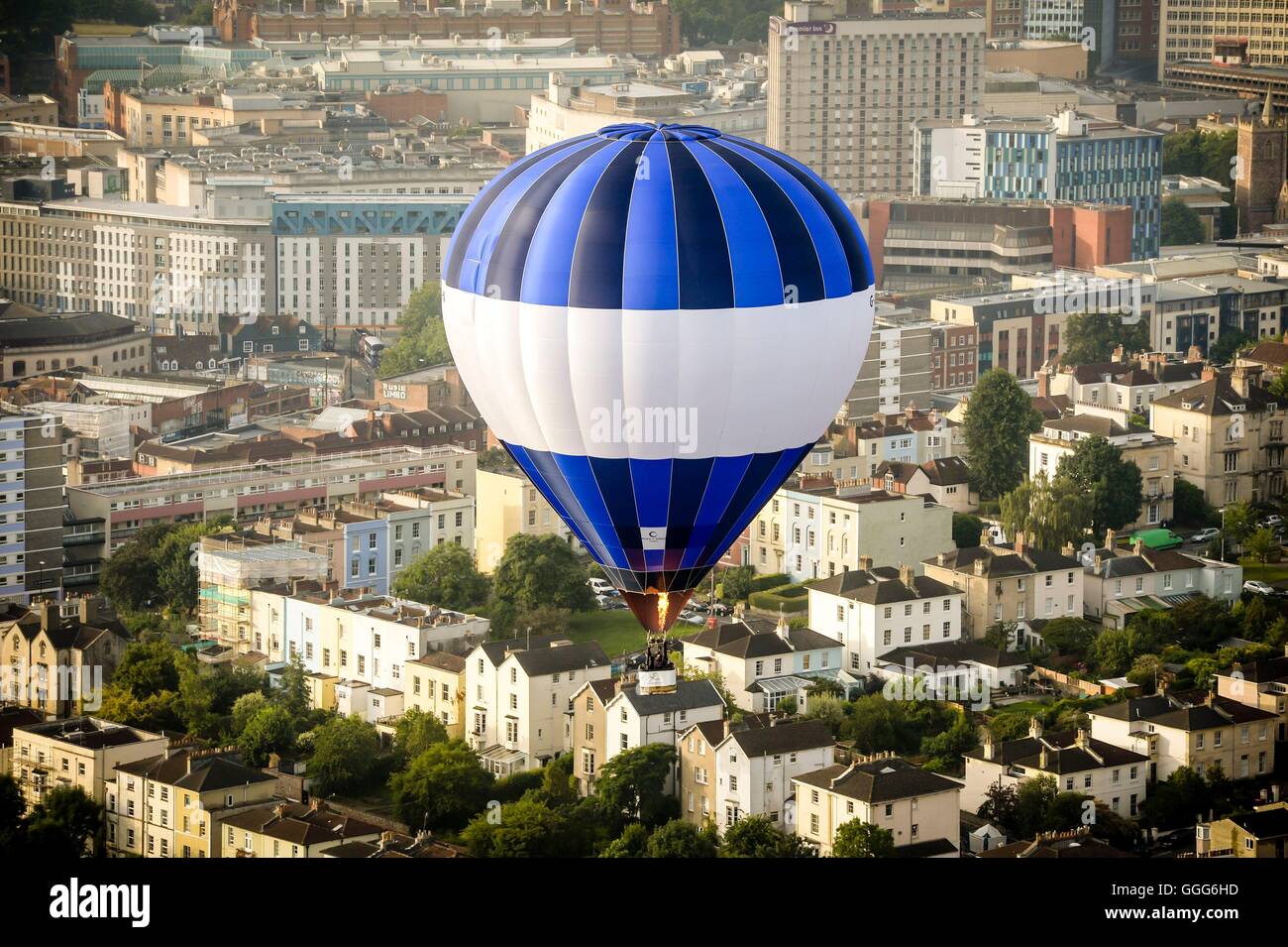 A hot air balloon passes over the city of Bristol during a mass balloon ...