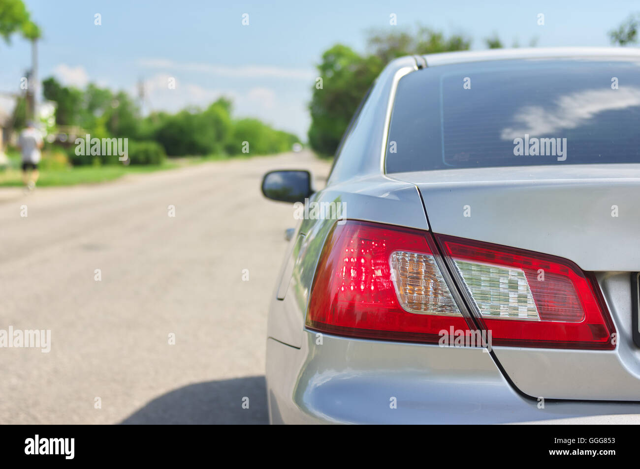 Car on the city road hi-res stock photography and images - Alamy