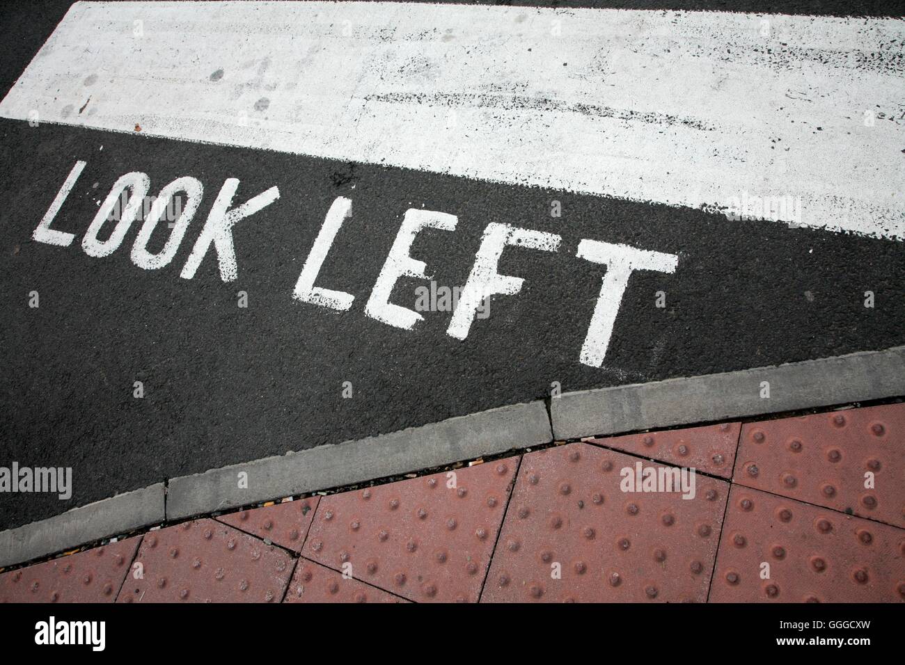 Traffic signs look left Stock Photo - Alamy