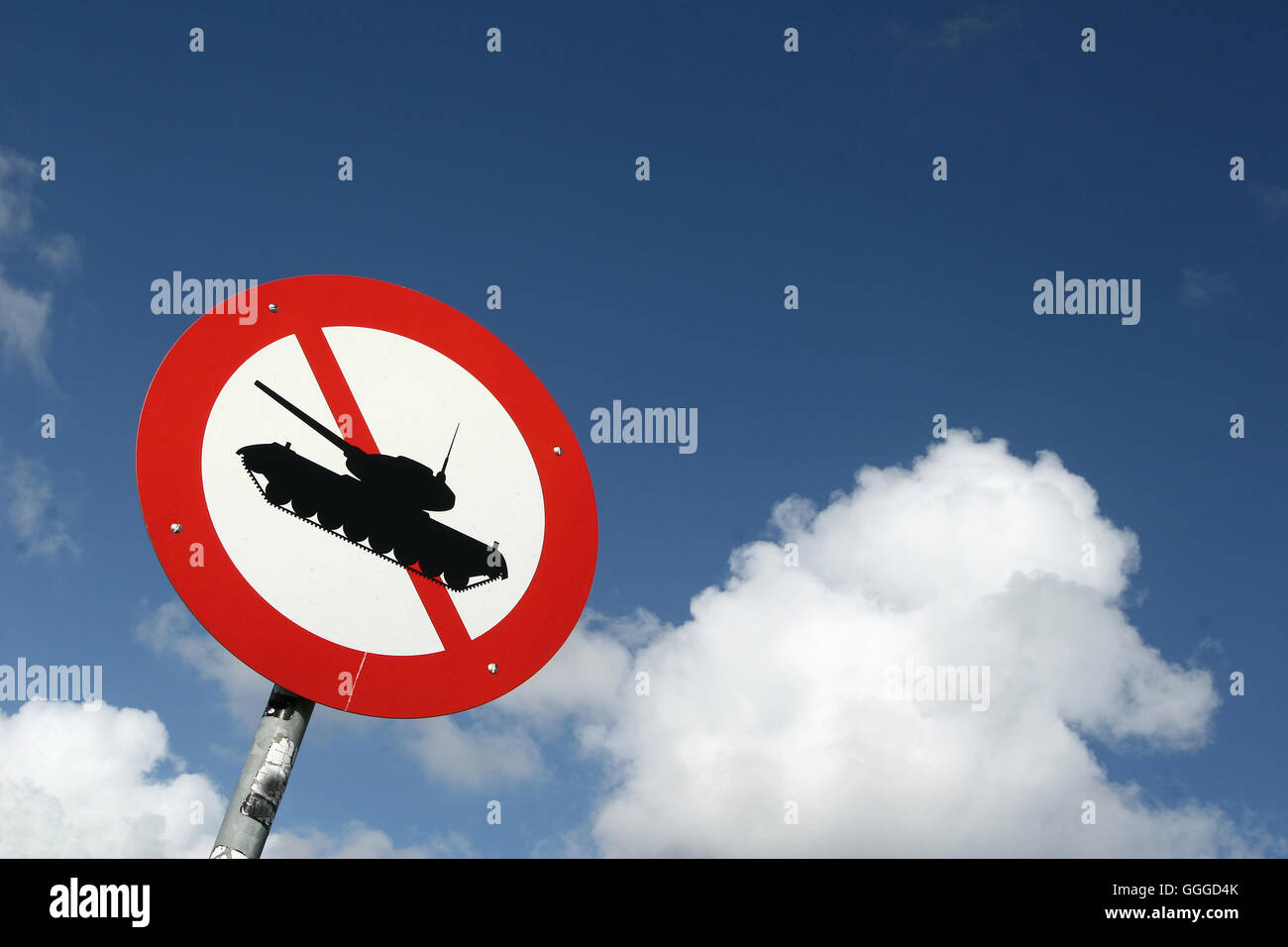 Traffic signs with a tank Stock Photo - Alamy