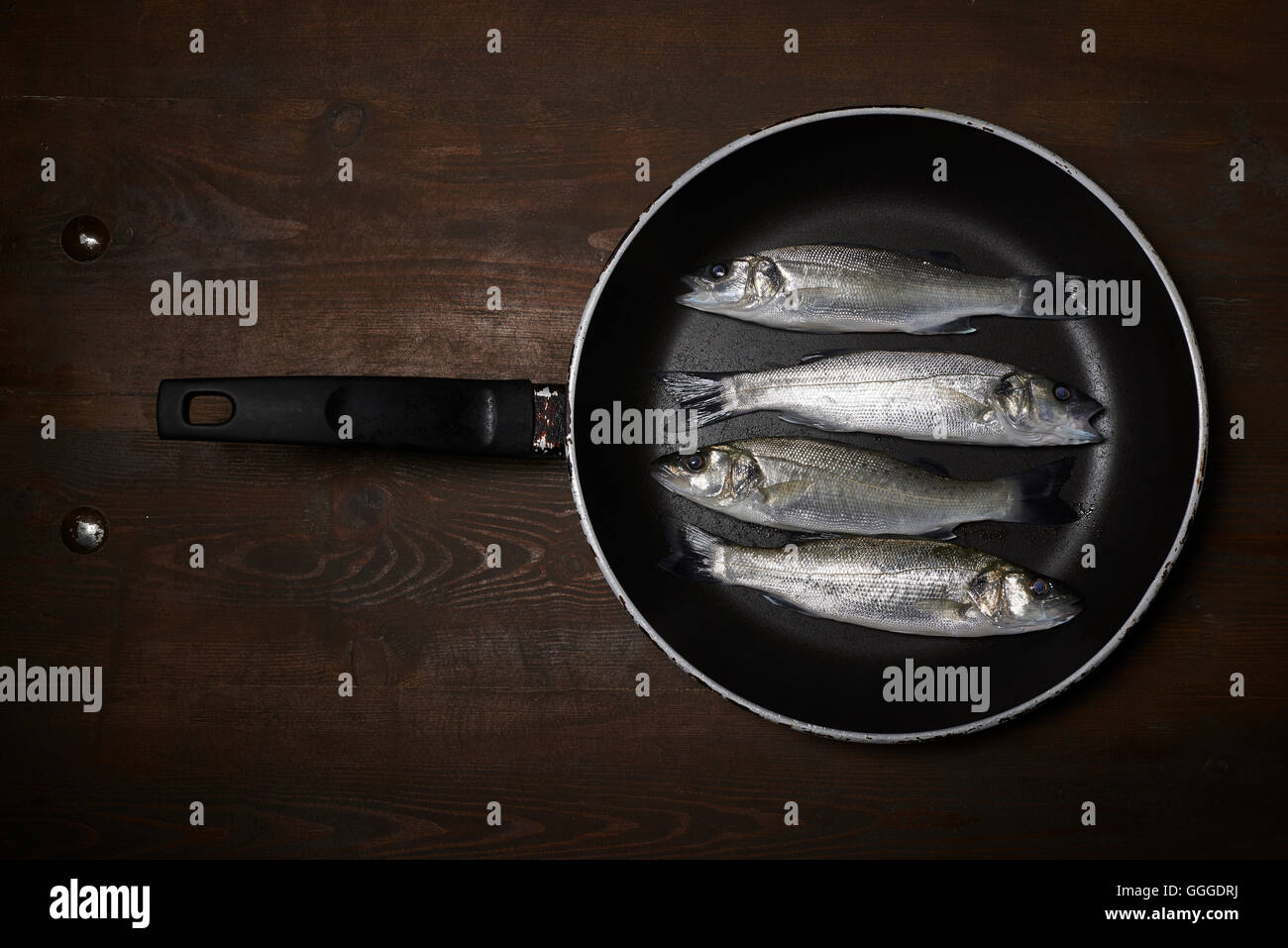 fresh fish, sea bass, ready for cooking Stock Photo - Alamy