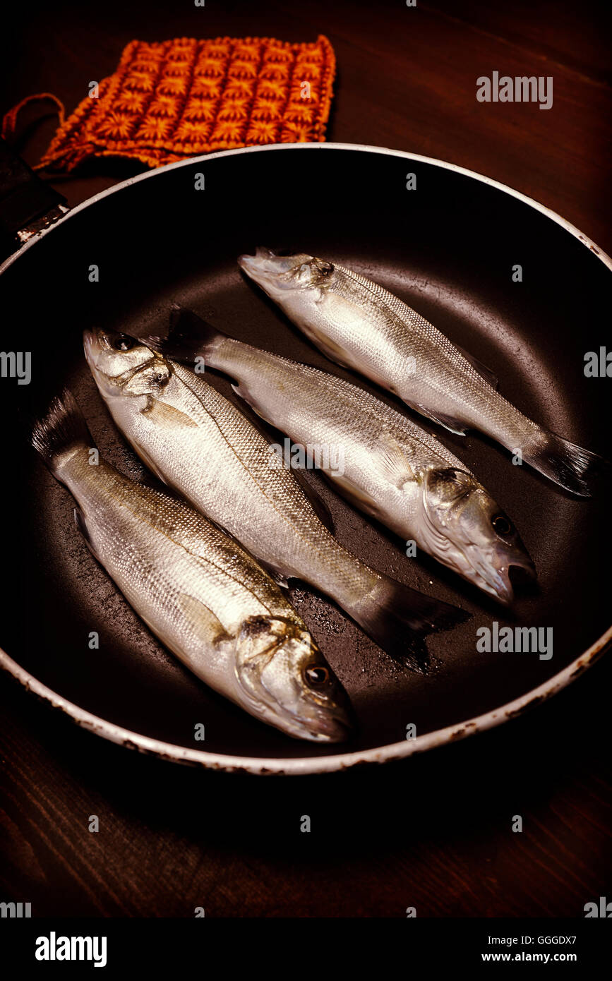 Vintage style photo, fresh fish, sea bass, ready for cooking Stock ...