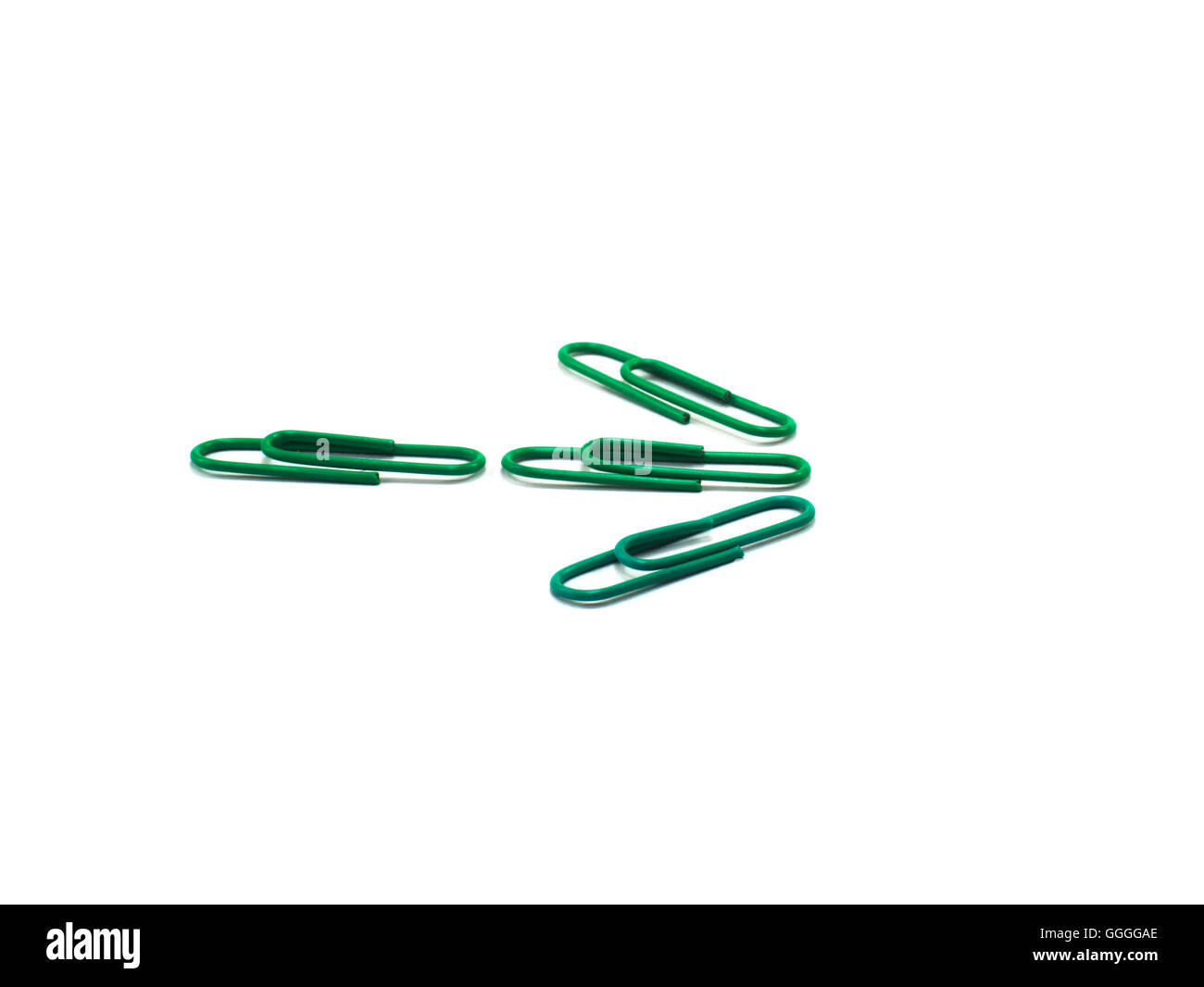 green paper clips Stock Photo - Alamy