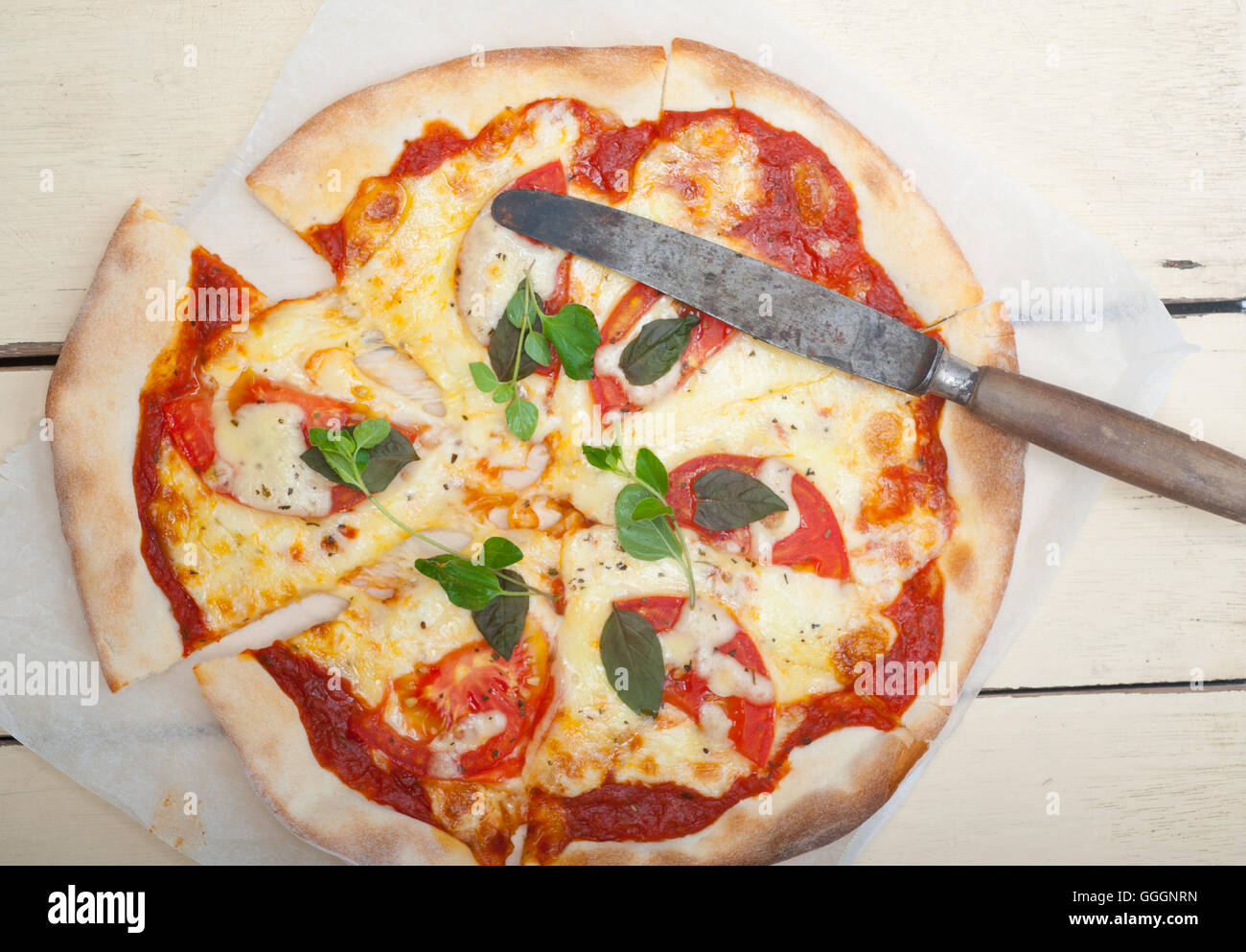 Italian traditional pizza Margherita tomato mozzarella and basil Stock Photo - Alamy