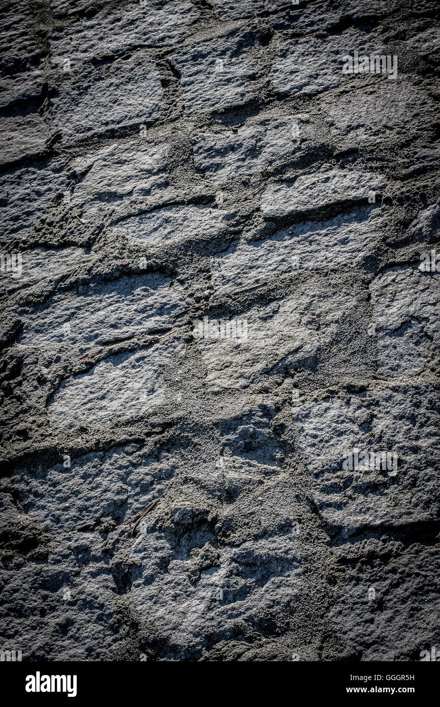 Pavement of large stones with cement or concrete background and texture ...