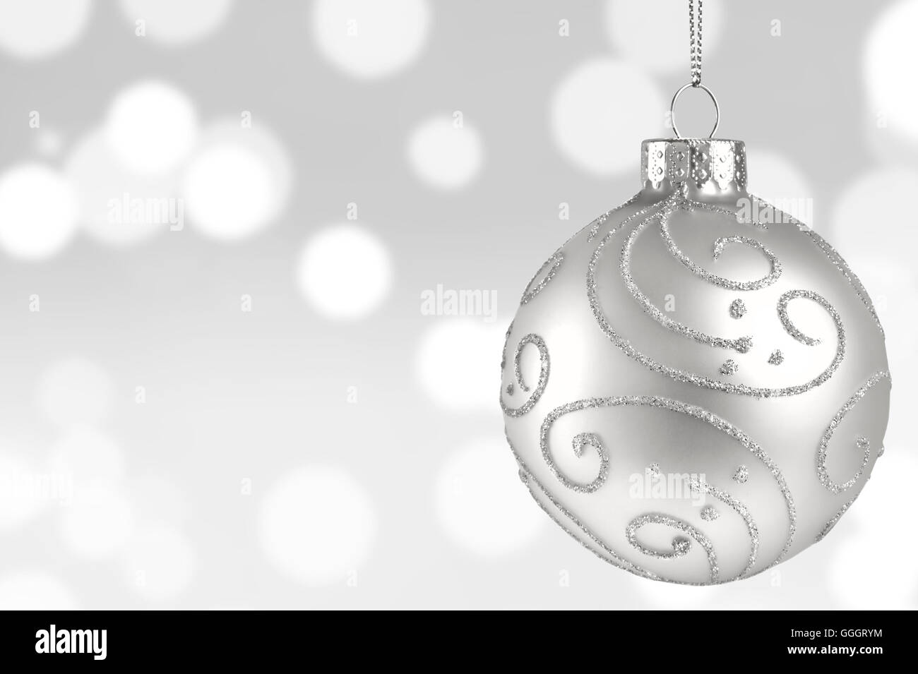 White Christmas Ball on a Glitter Background Stock Photo - Alamy
