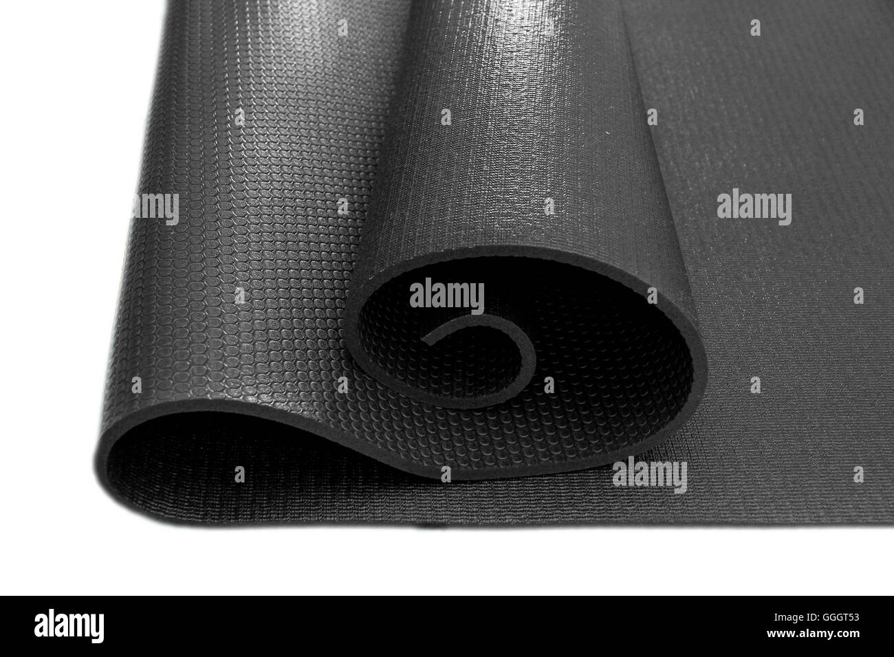 Black Yoga mat on White background Stock Photo - Alamy