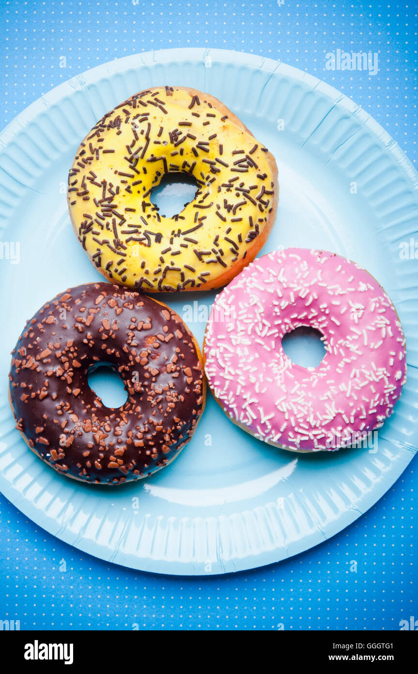 glazed donuts on a plate Stock Photo - Alamy