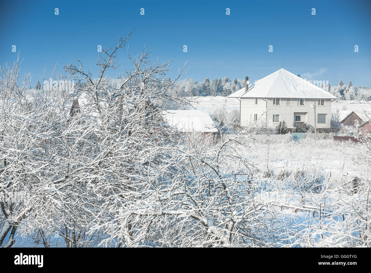Country houses after snowfall Stock Photo - Alamy