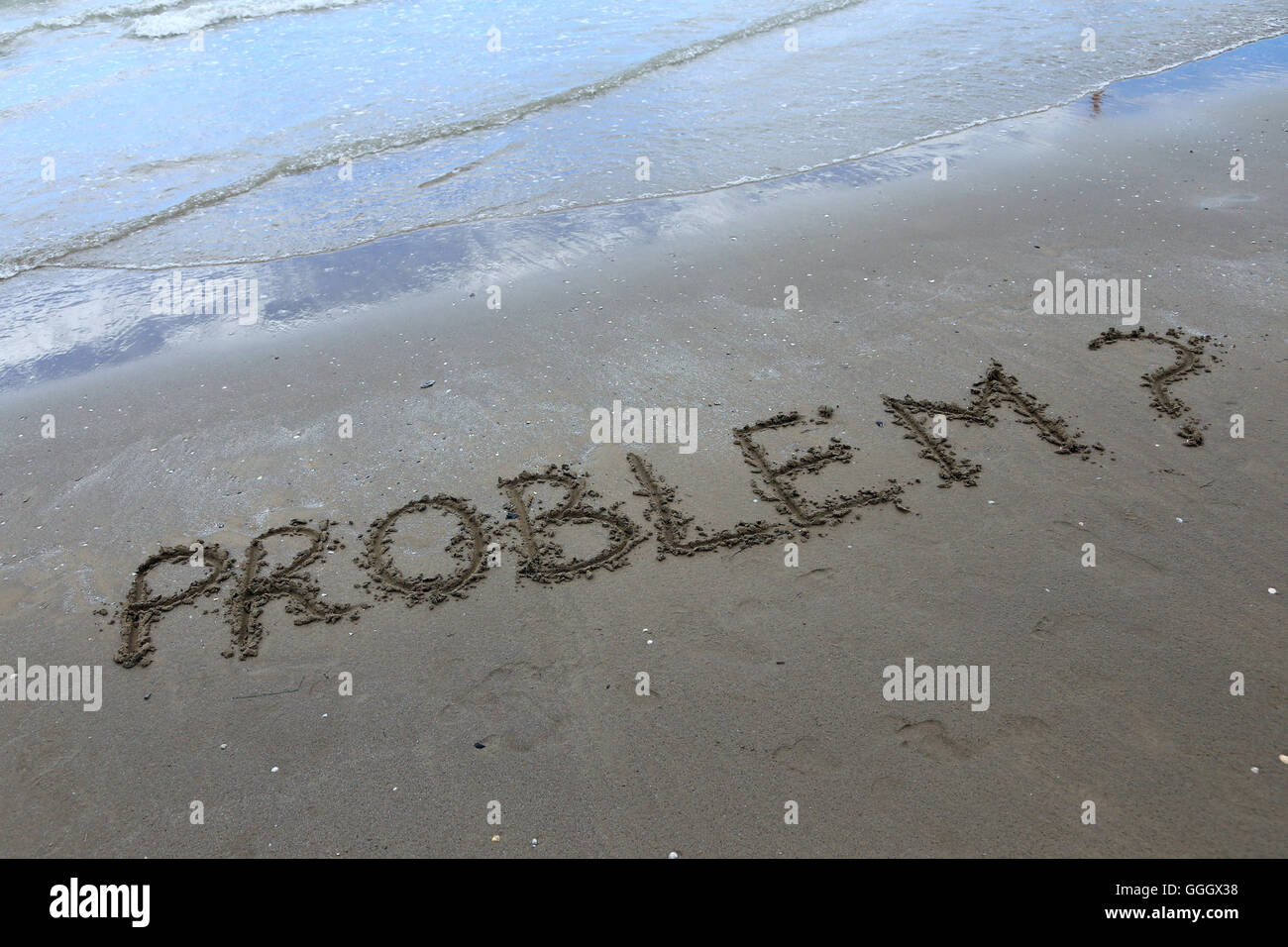 PROBLEM written on the beach in summer Stock Photo - Alamy