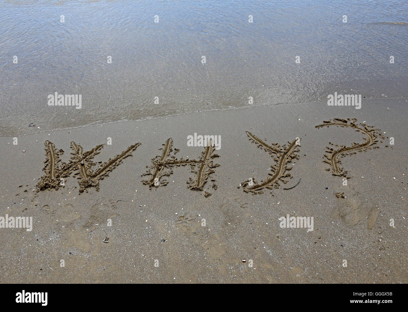why big written on the sand Stock Photo - Alamy