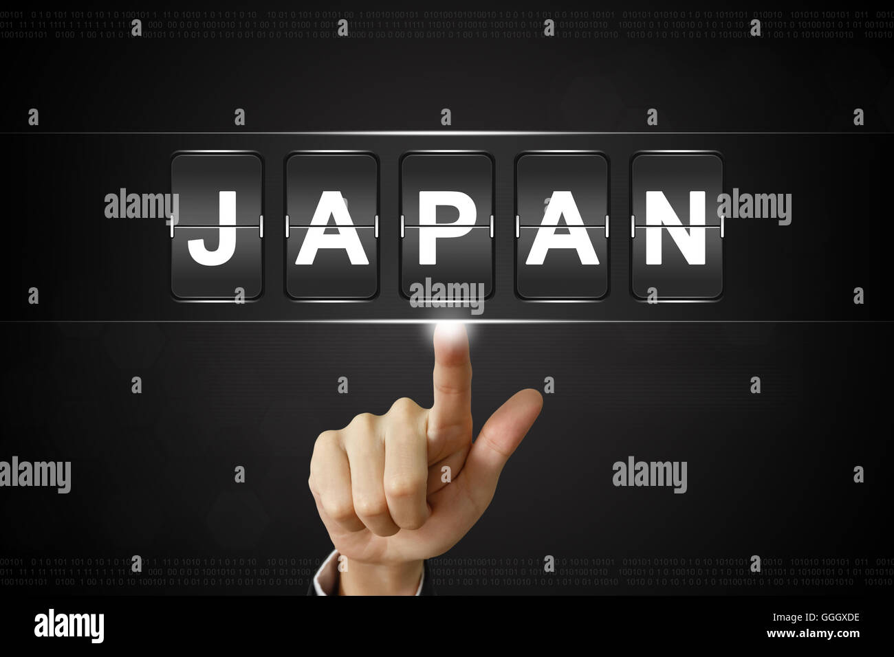 business hand pushing JAPAN on Flipboard Display Stock Photo - Alamy