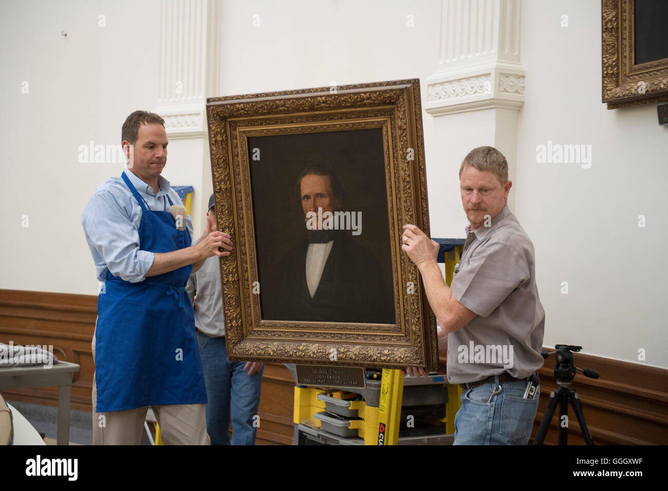 Workers moving all 51 portraits of former Texas governors to make room ...