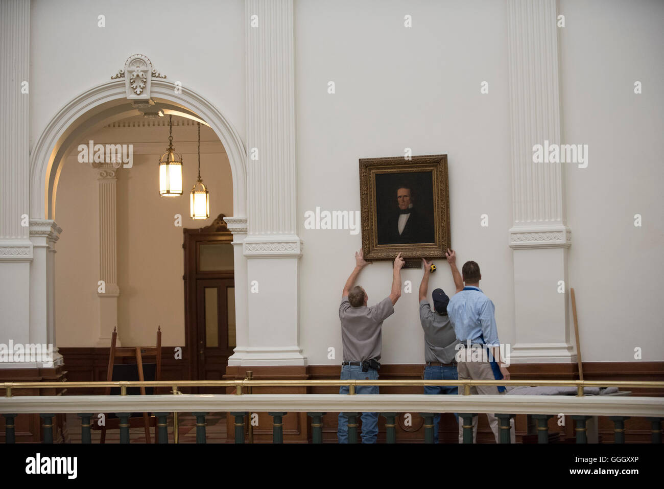 Workers moving all 51 portraits of former Texas governors to make room ...