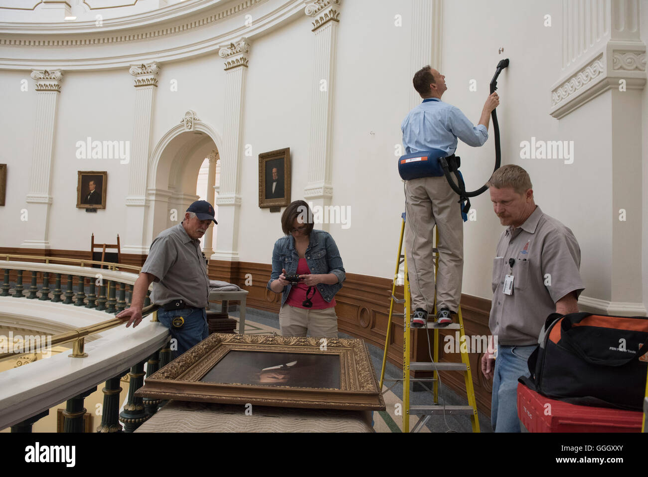 Workers moving all 51 portraits of former Texas governors to make room ...