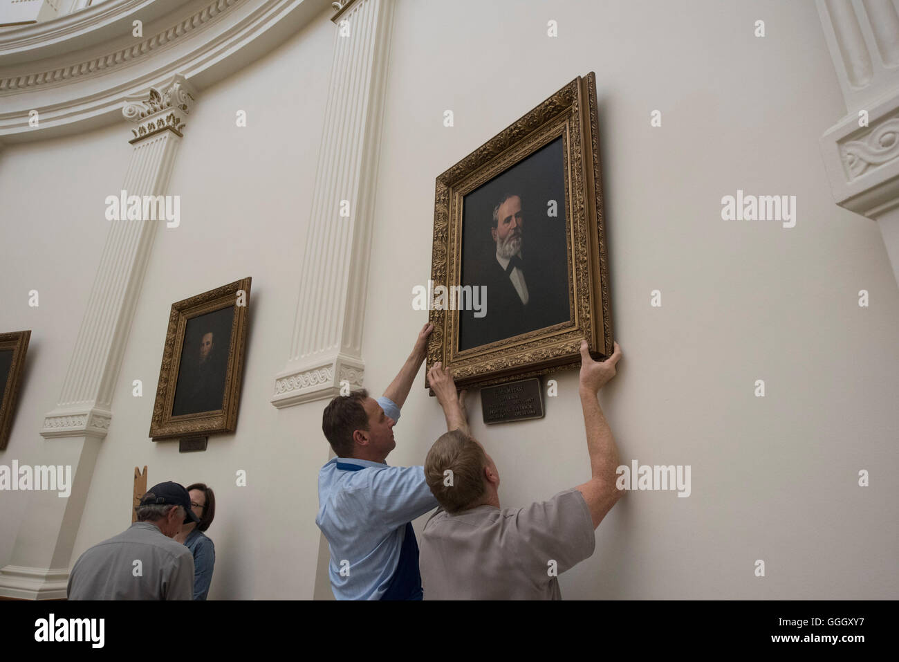 Workers start moving all 51 portraits of former Texas governors to make ...