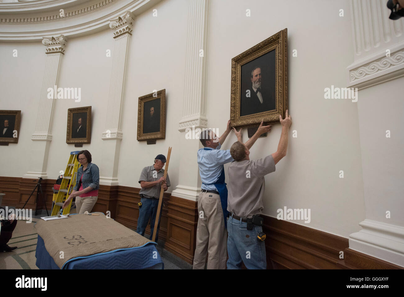 Workers start moving all 51 portraits of former Texas governors to make ...