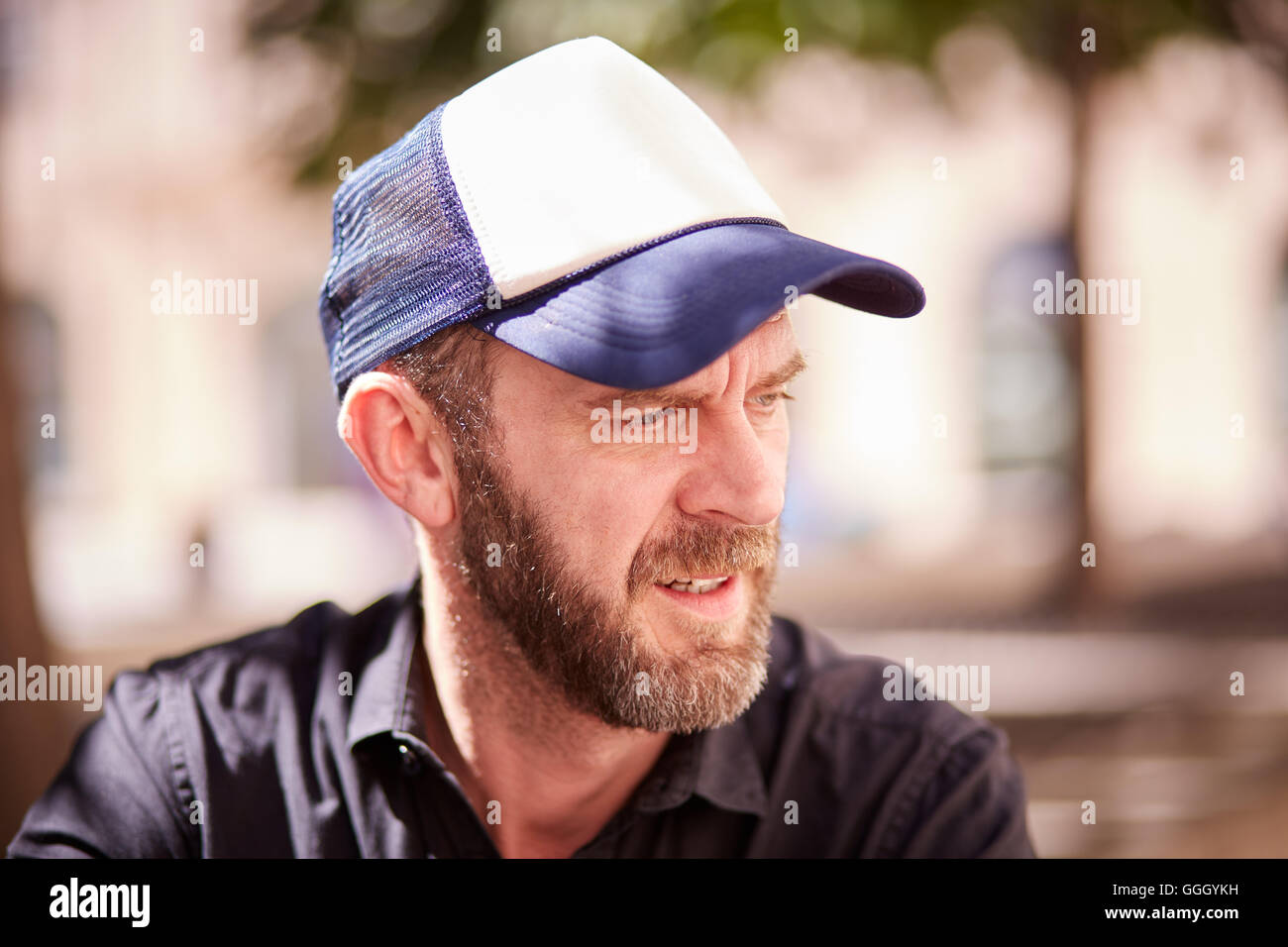 Bearded man in baseball cap hi-res stock photography and images - Alamy