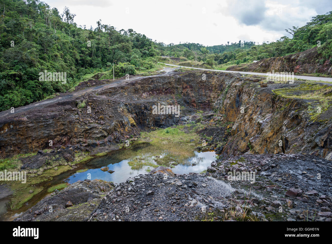 A quarry carved into tropical rain forest to mine tar sand. Ecuador ...