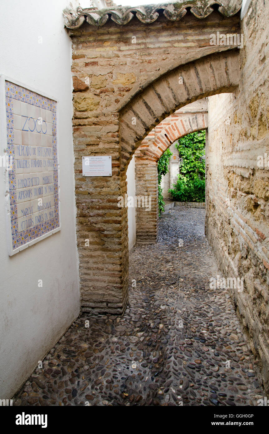 Narrow alley with arches Stock Photo - Alamy
