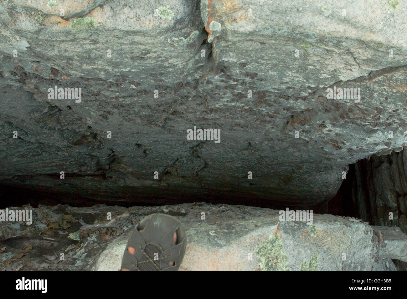 Standing on the edge of a deep fissure in rock town Stock Photo - Alamy
